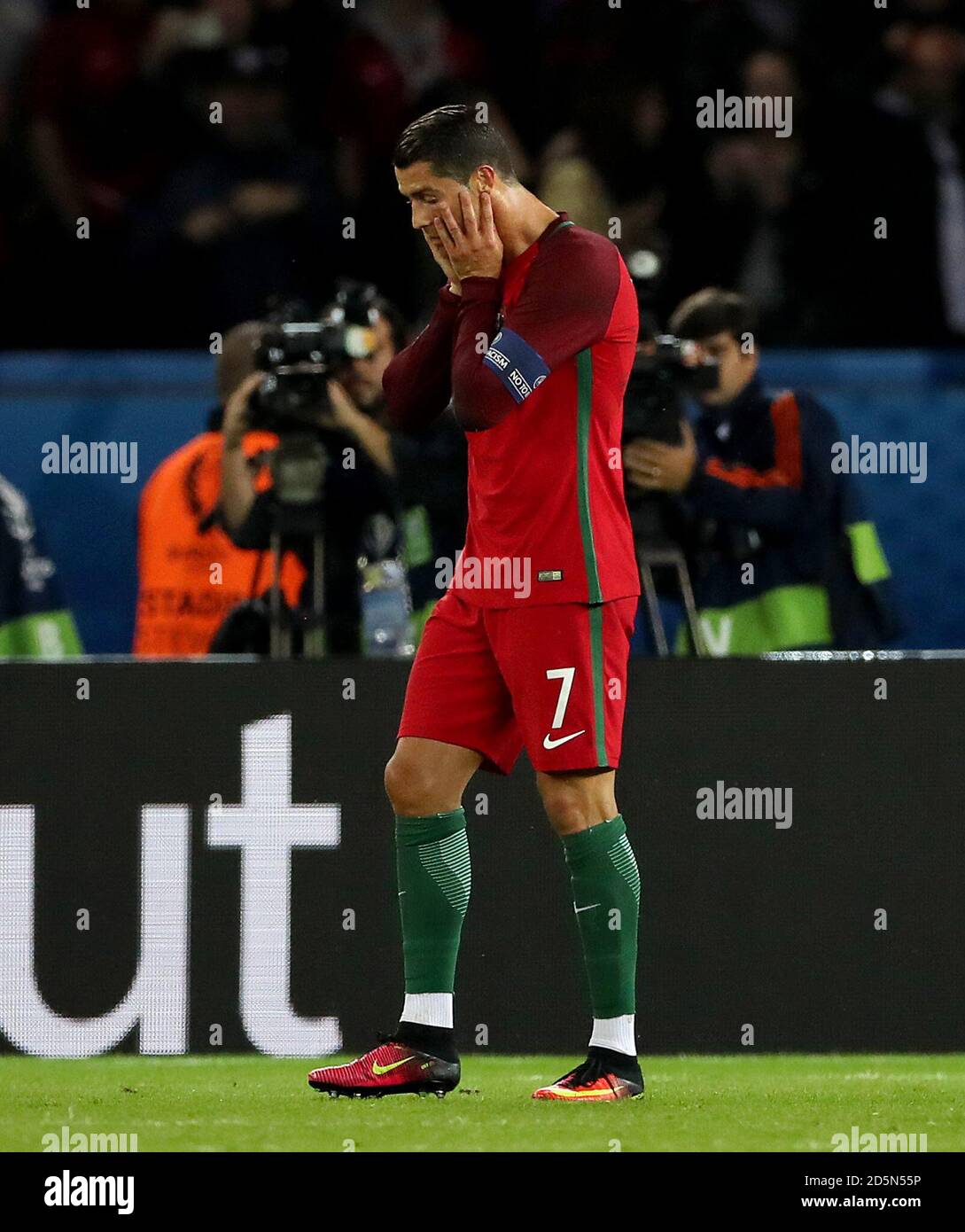 Portugal's Cristiano Ronaldo holds his head in his hands after missing ...