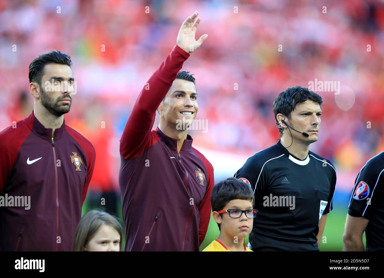Portugal's Cristiano Ronaldo (centre) waves to the crowd before the ...