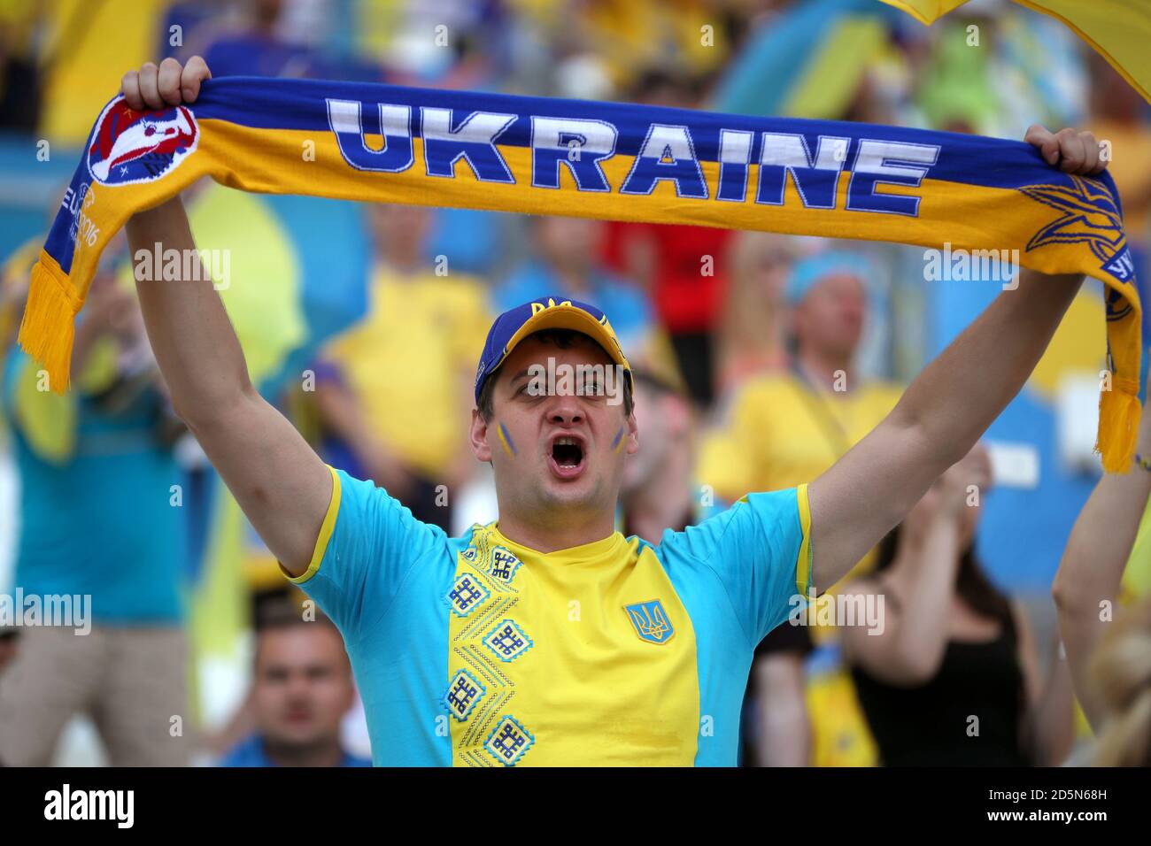 A Ukraine fan in the stands show his support Stock Photo - Alamy