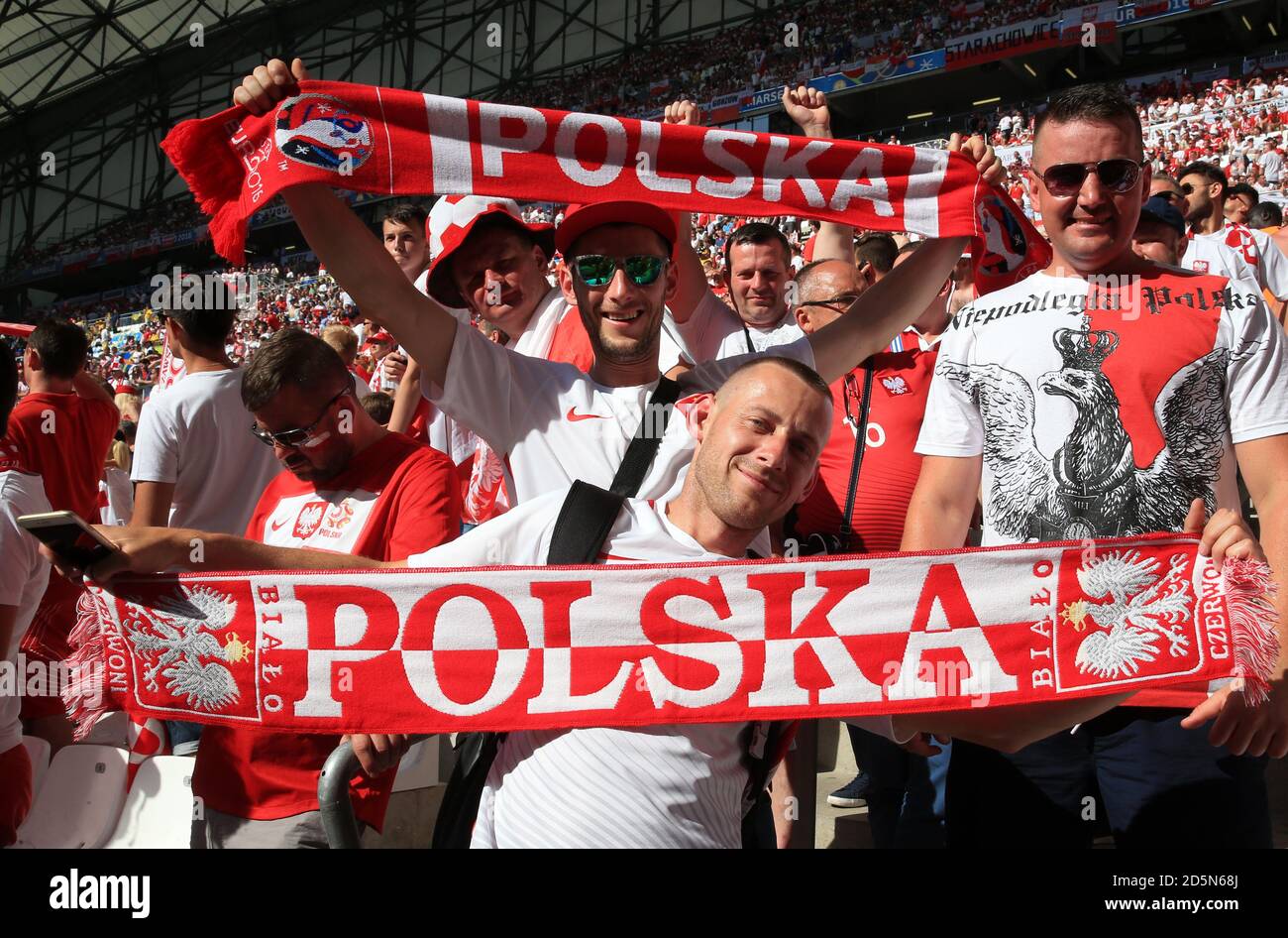 Poland fans in the stands show their support Stock Photo - Alamy