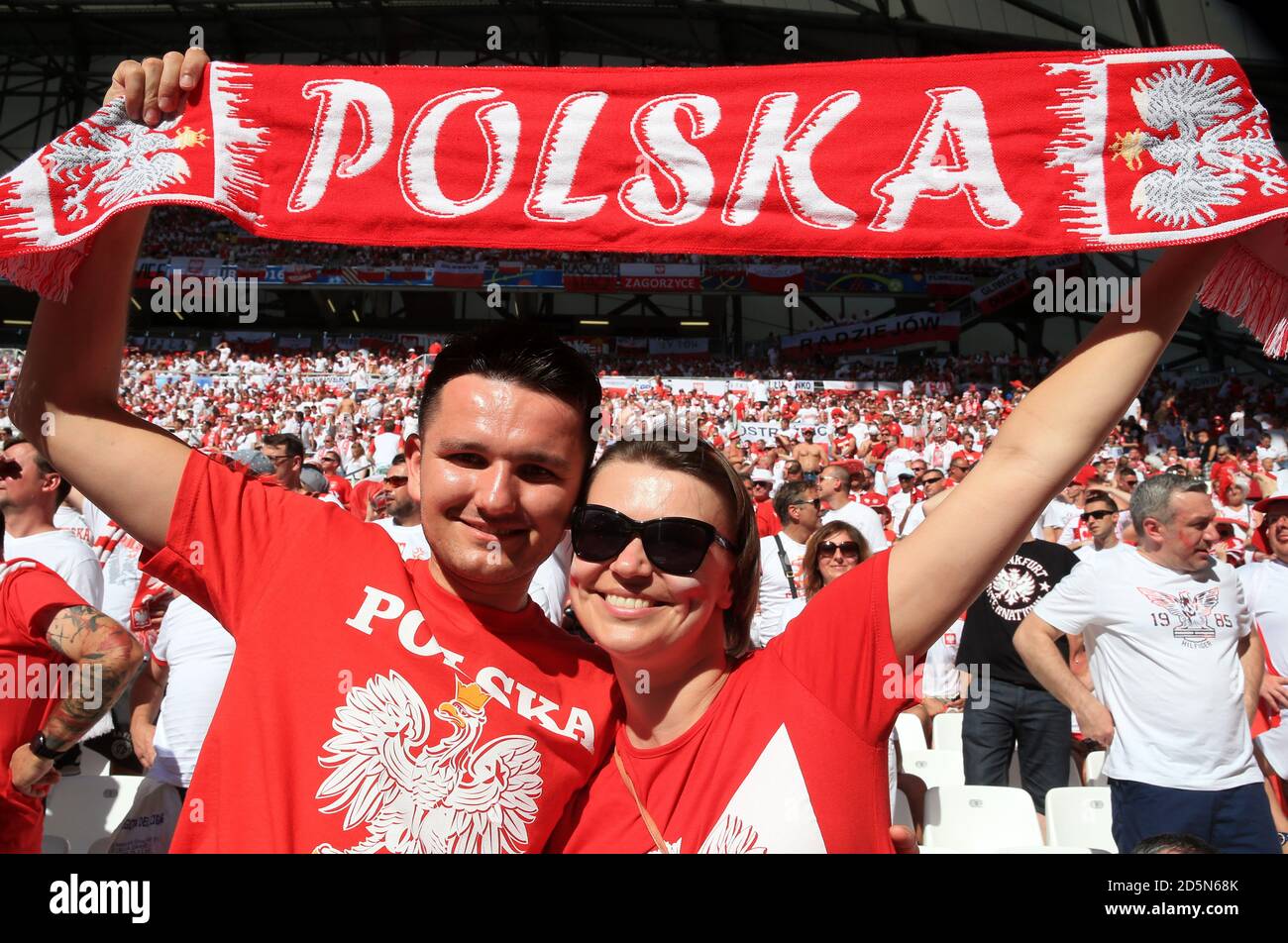 Poland fans in the stands show their support Stock Photo - Alamy