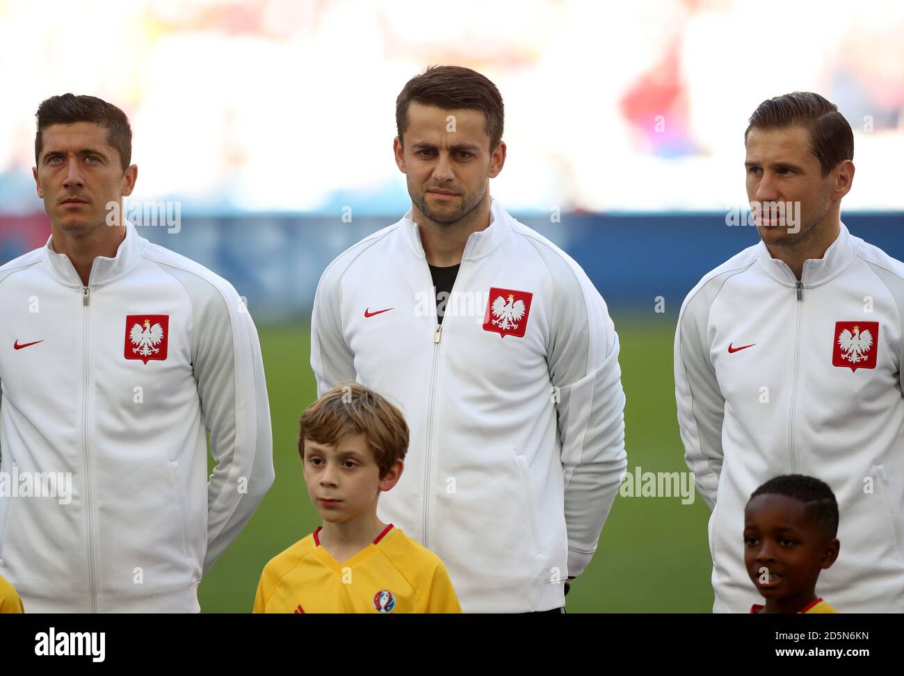 (left-right) Poland's Robert Lewandowski, goalkeeper Lukasz Fabianski ...