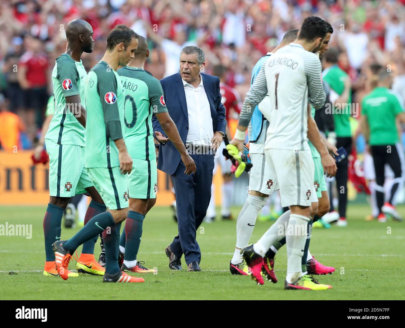 Portugal manager Fernando Santos (centre) after the final whistle Stock ...