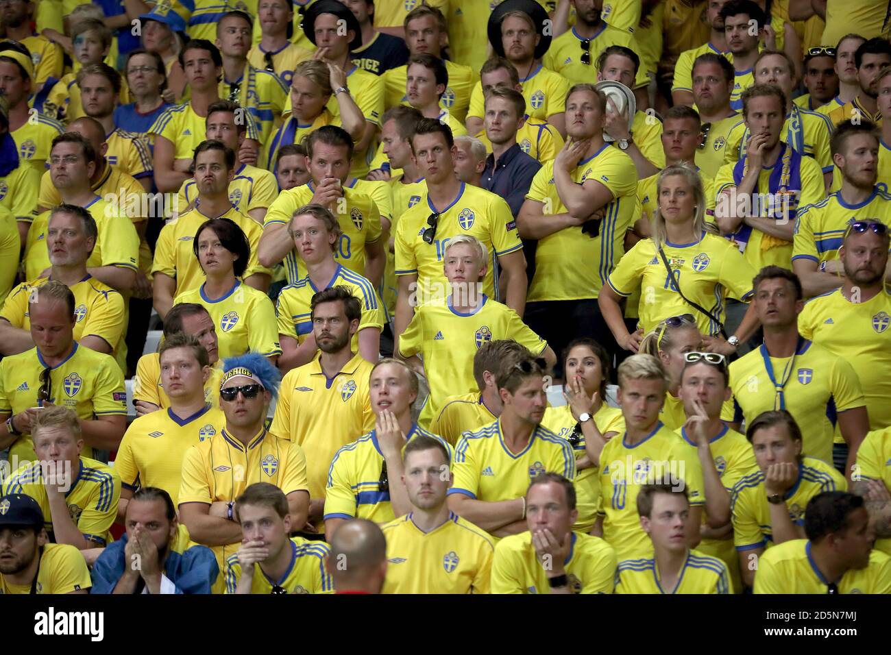 Sweden fans appear dejected in the stands after the final whistle Stock ...