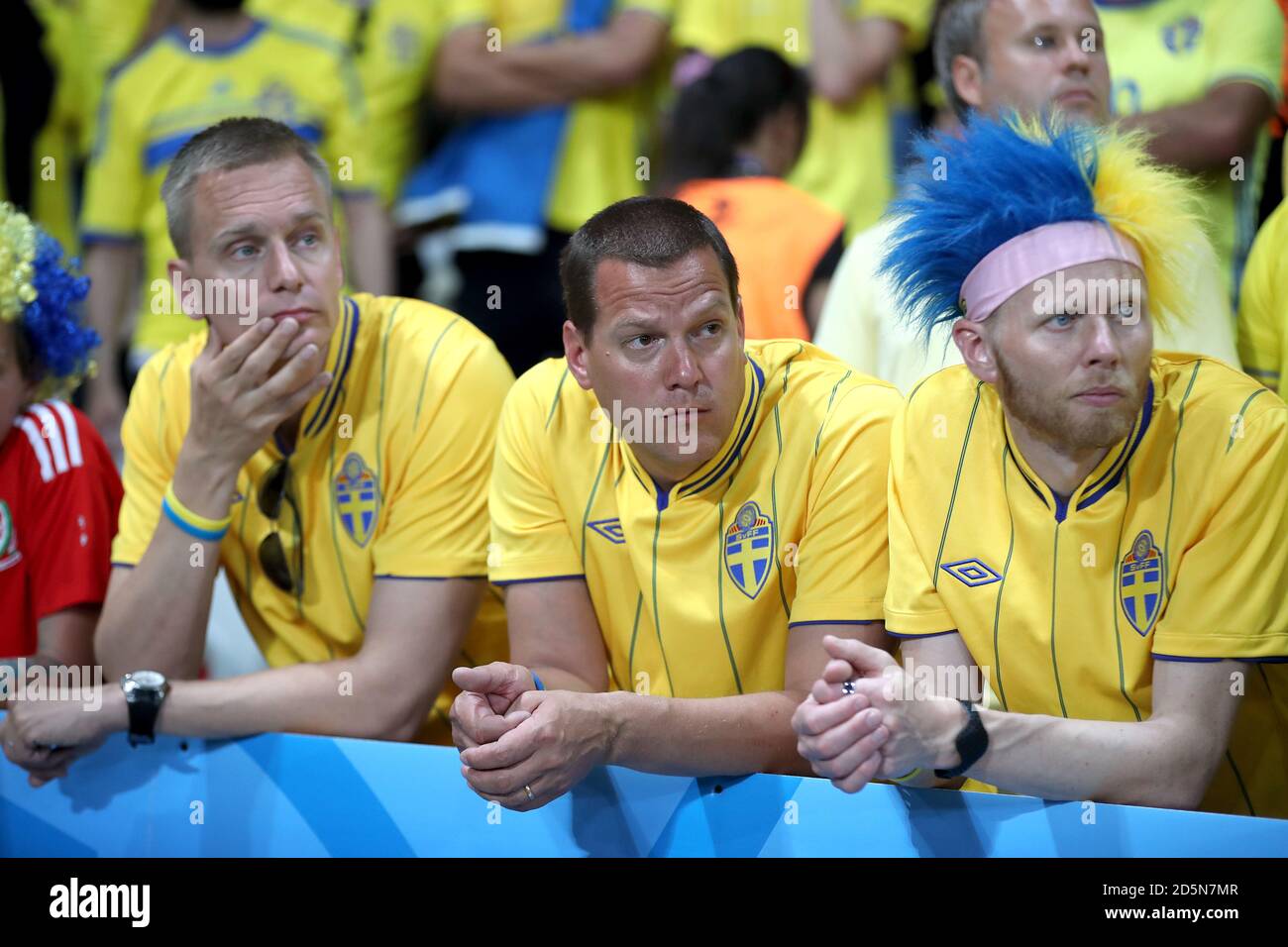 Sweden fans appear dejected in the stands after the final whistle Stock ...