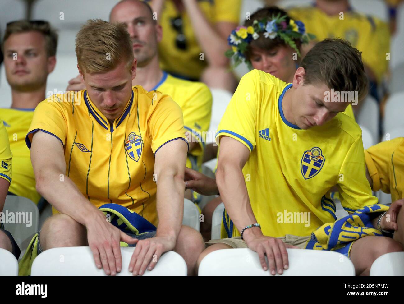Sweden fans appear dejected in the stands after the final whistle Stock ...