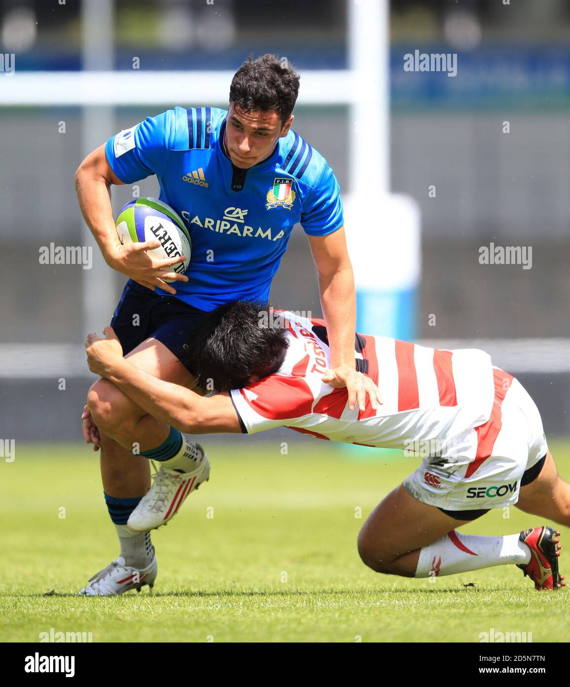 Italy's Marco Zanon is tackled by Japan's Shintaro Nagatomi Stock Photo ...
