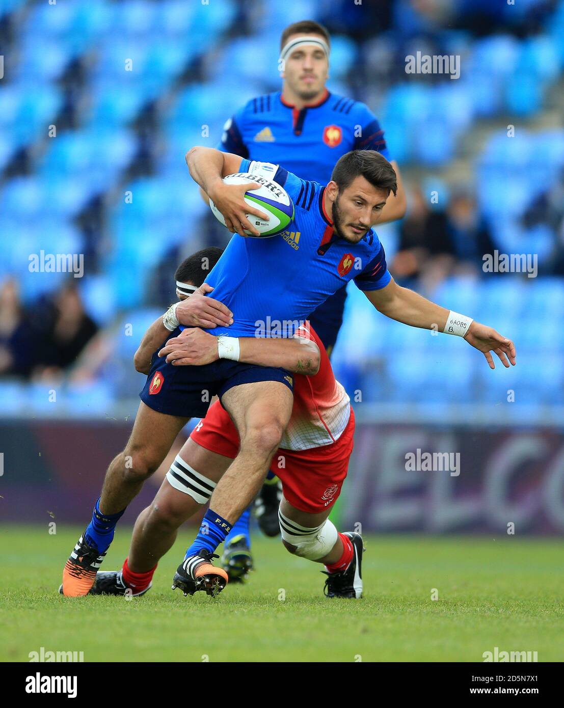 Georgia's Irakli Tskhadiridze tackles France's Christopher Kaiser Stock Photo - Alamy