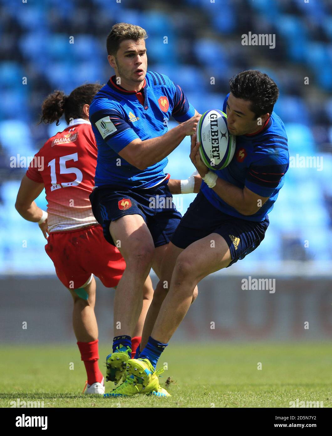 France's Atila Septar (left) and Damian Penaud (right) go for the same ...