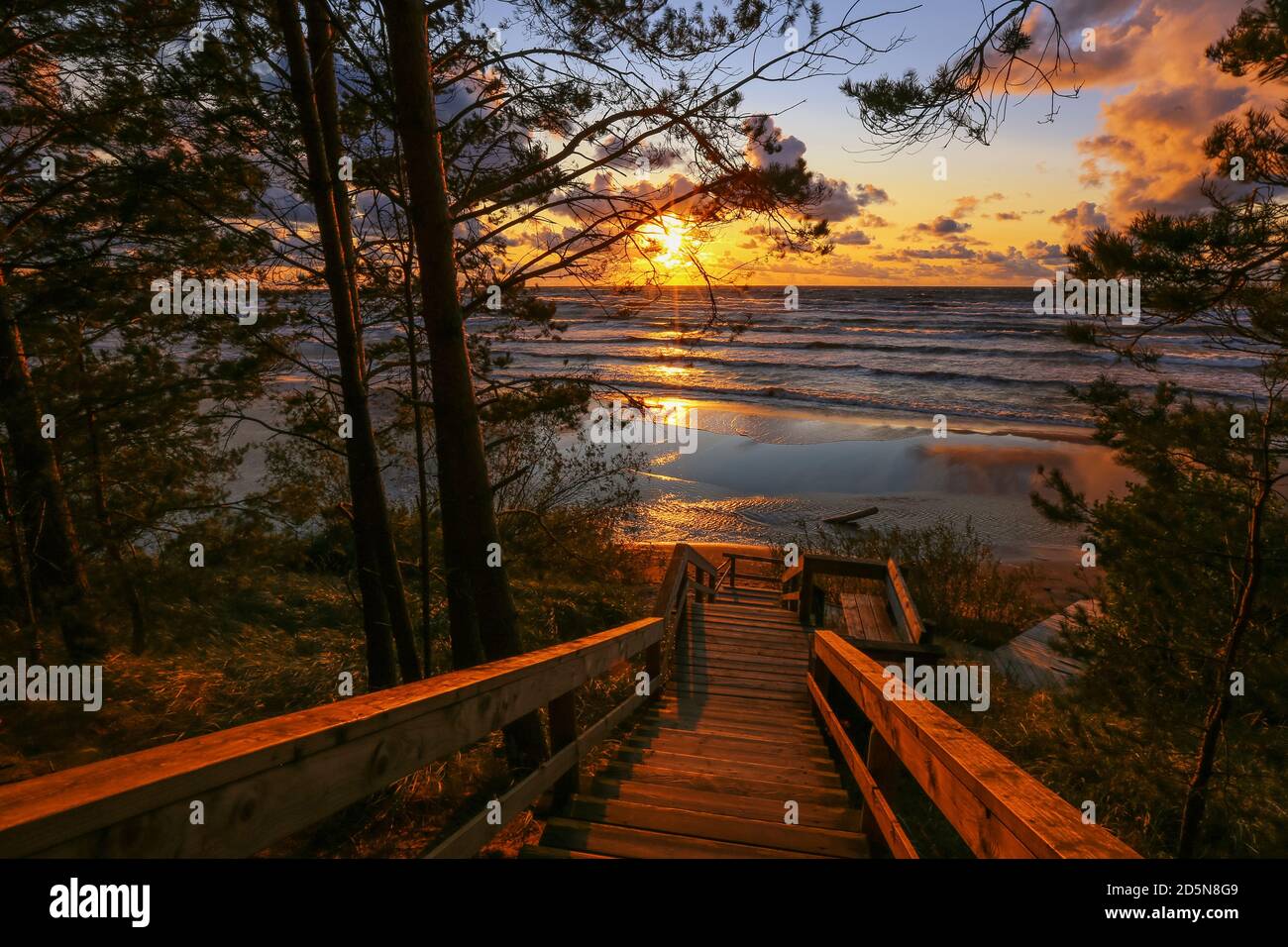 Colorful summer sunset at the Beach Saulkrasti, popular touristic place ...