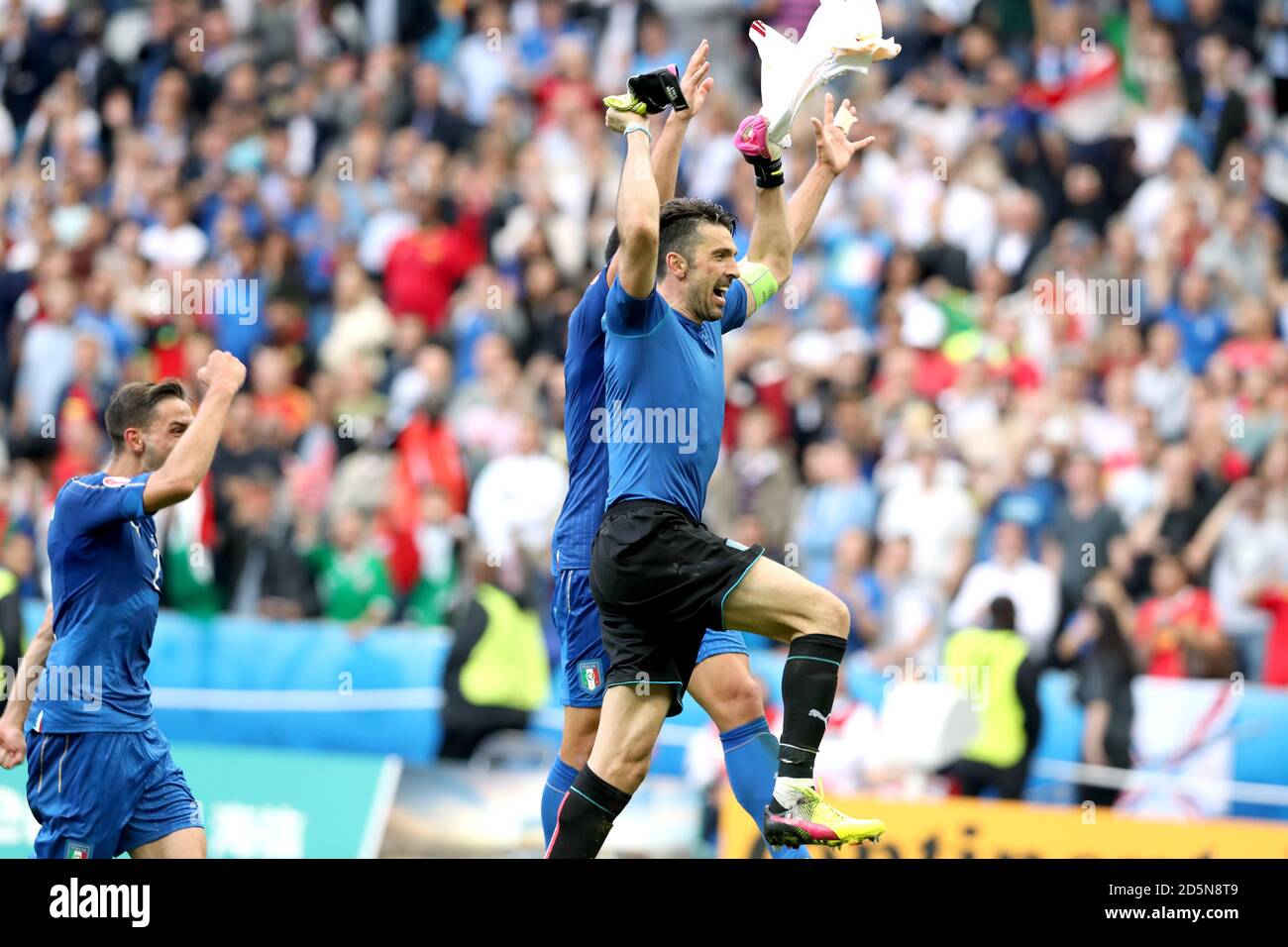 Italy goalkeeper Gianluigi Buffon celebrates victory after the match ...
