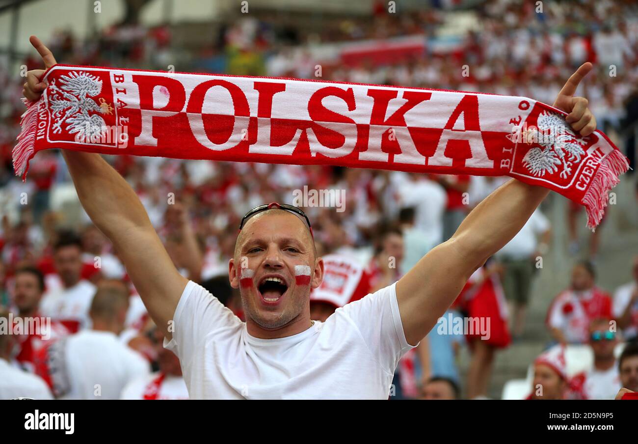Poland fans in the stands Stock Photo - Alamy