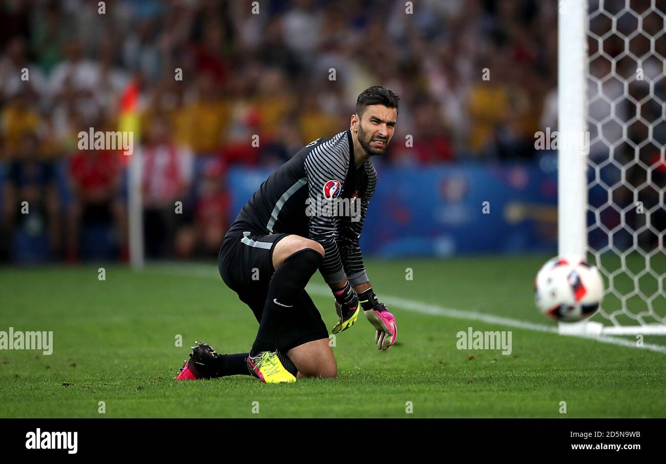 Portugal goalkeeper Rui Patricio saves a penalty from Poland's Jakub ...