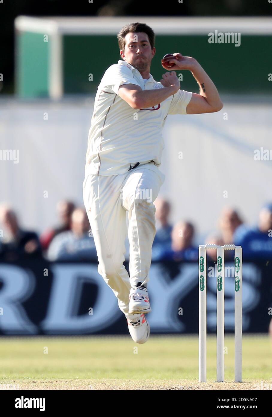 Surrey's Mark Footitt bowls Stock Photo - Alamy