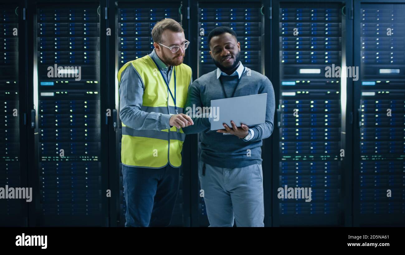 Bearded Black IT Engineer Standing and Smiling in the Middle of a ...