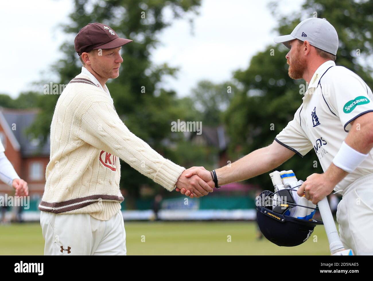 Surrey's Captain Gareth Batty (left) congratulates Warwickshire captain ...