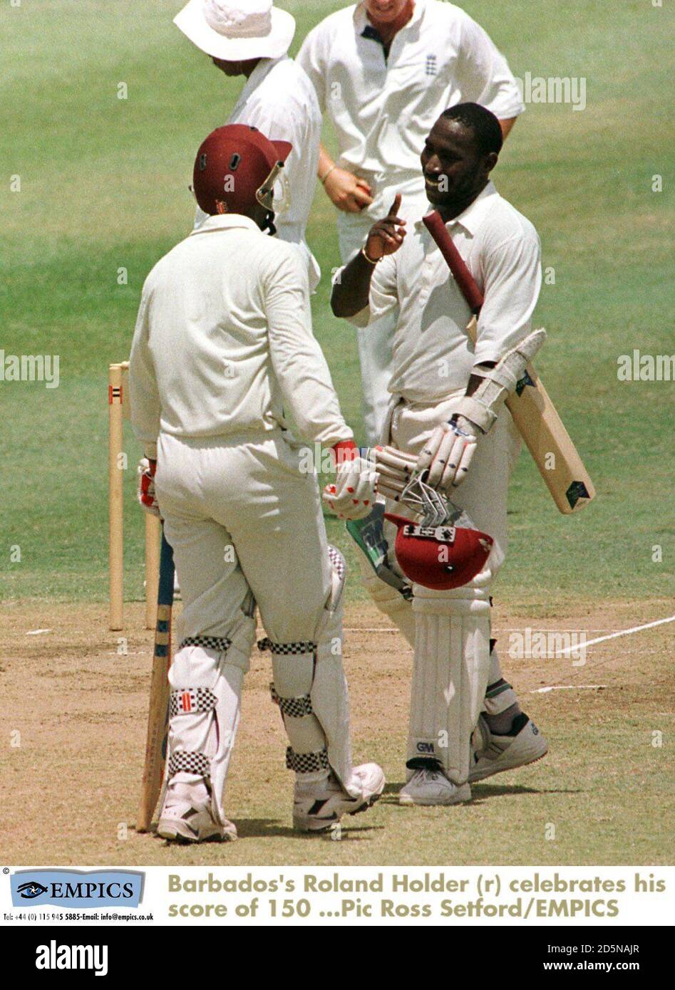 Barbados's Roland Holder (r) celebrates his score of 150 Stock Photo ...