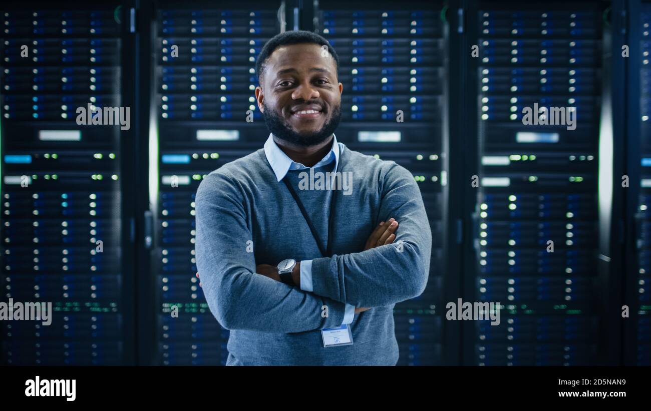 Bearded Black IT Engineer Standing and Posing with Crossed Arms in the ...