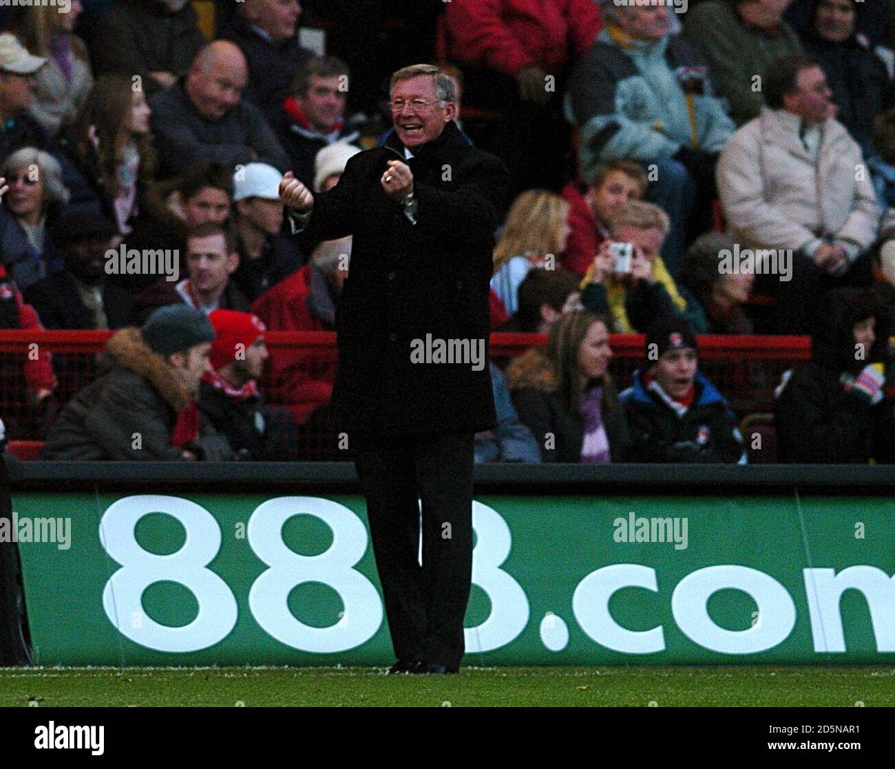 Manchester United manager Sir Alex Ferguson celebrates Alan Smith's ...