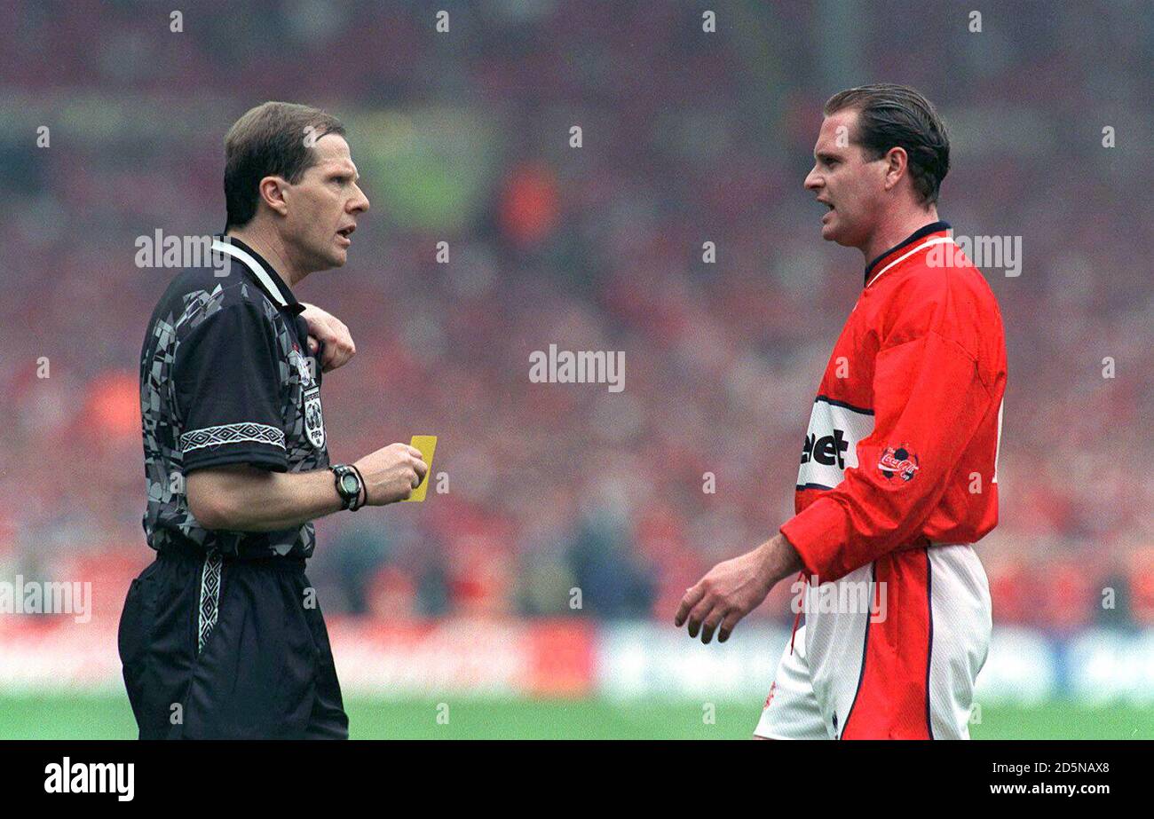 Middlesbrough's Paul Gascoigne is booked by referee Peter Jones Stock ...