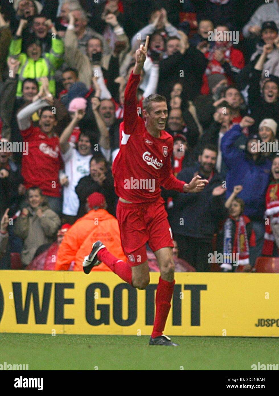 Liverpool's Peter Crouch celebrates his long awaited first goal for ...