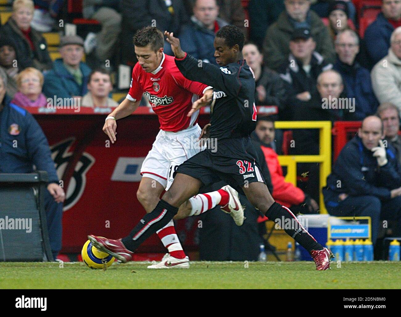 Charlton Athletic's Darren Ambrose is tackled by Sunderland's Justin ...