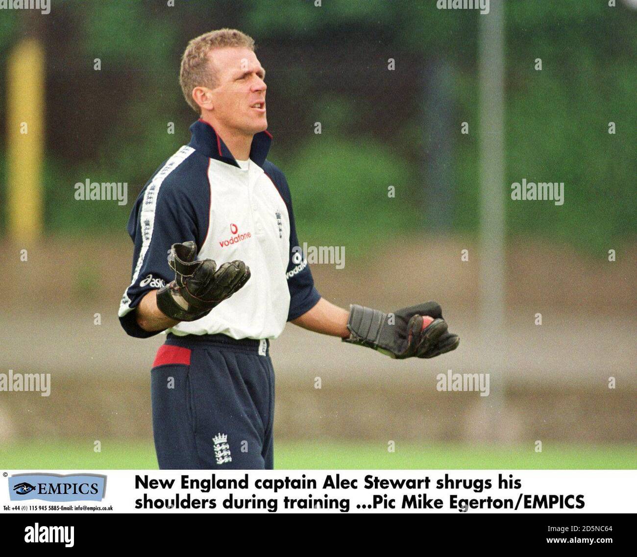 New England captain Alec Stewart shrugs his shoulders during training ...