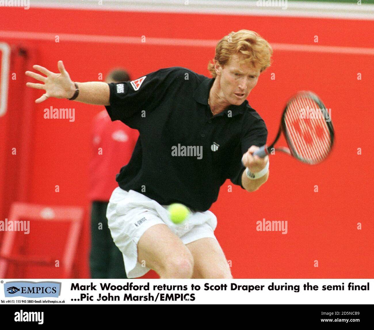 Mark Woodford returns to Scott Draper during the semi final Stock Photo ...