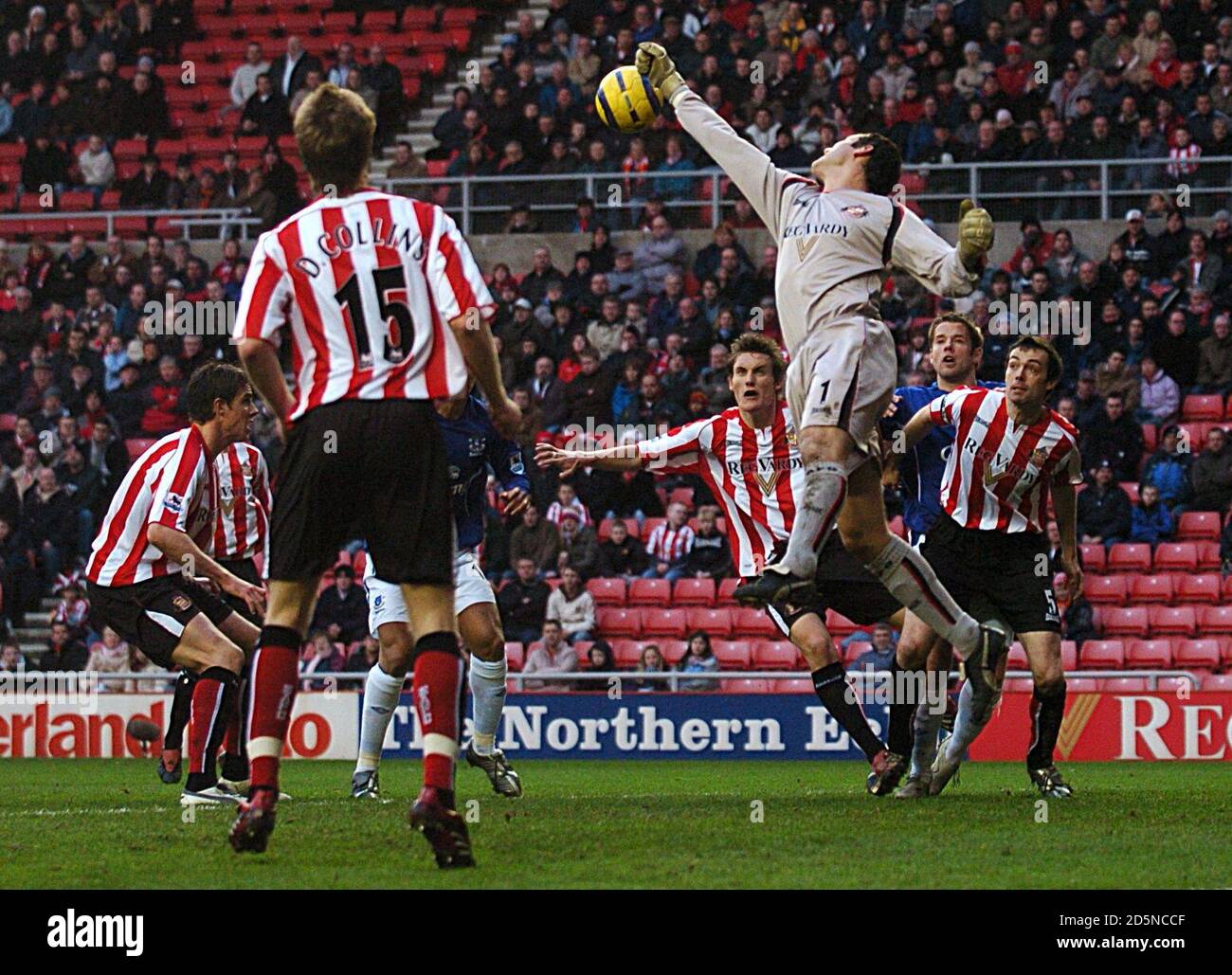 Everton goalkeeper Nigel Martyn punches the ball away from the ...