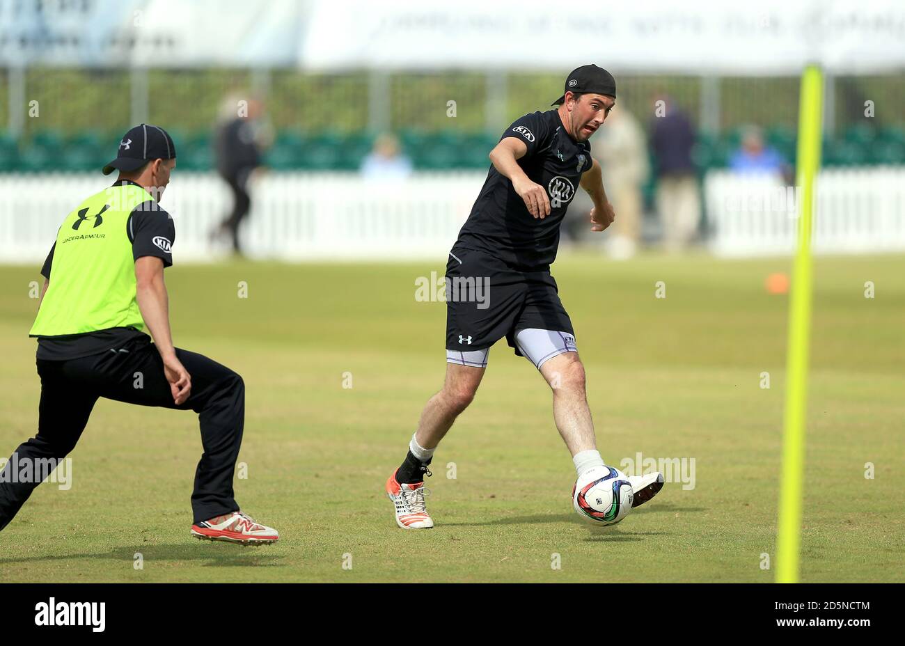 Surrey's Mark Footitt (right) during the warm-up Stock Photo - Alamy