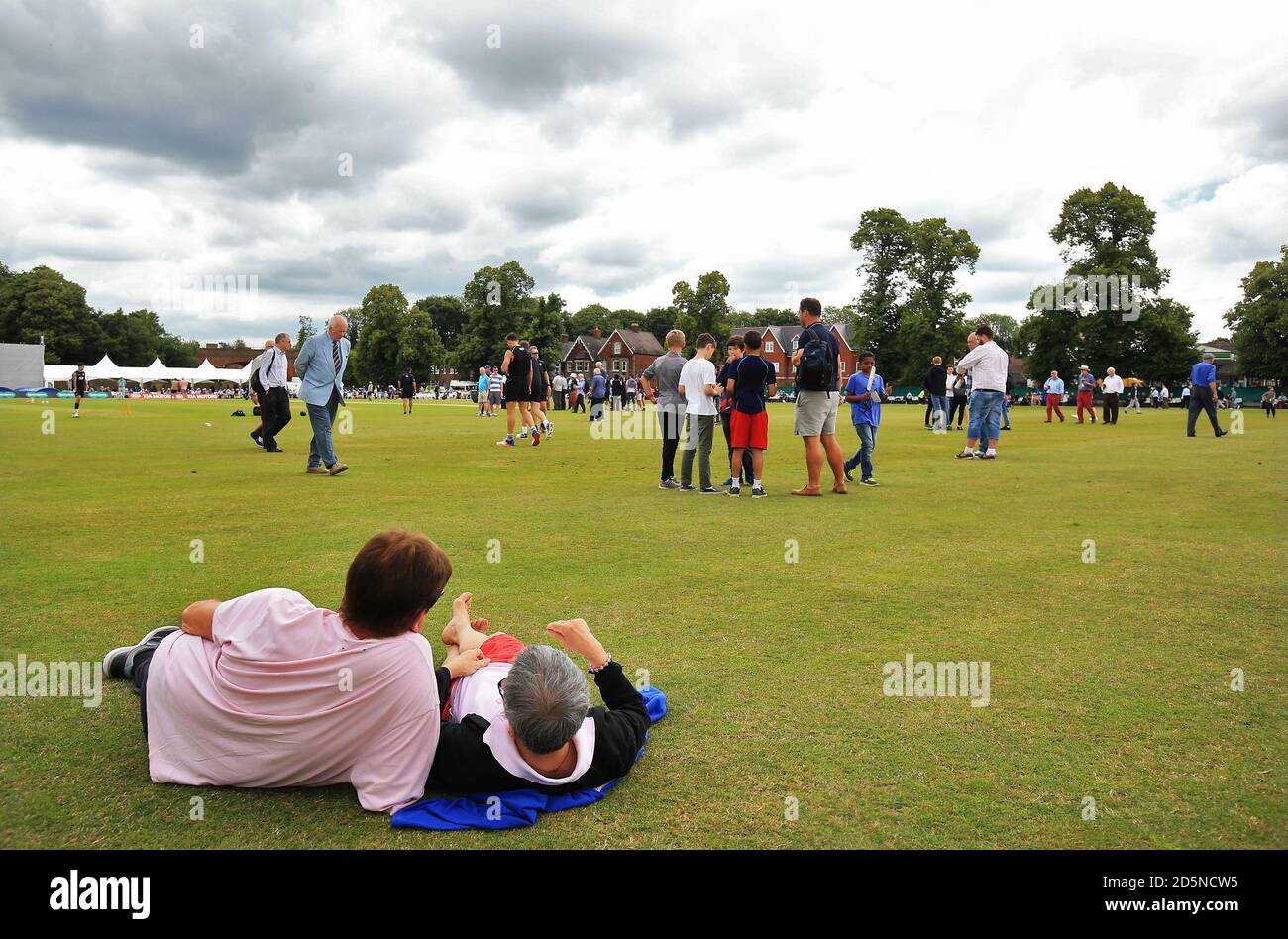 Spectators on the pitch during the lunch break Stock Photo - Alamy