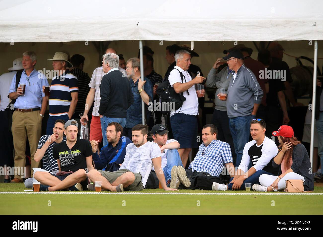 Spectators look on from the boundary at The Sports Ground Stock Photo ...