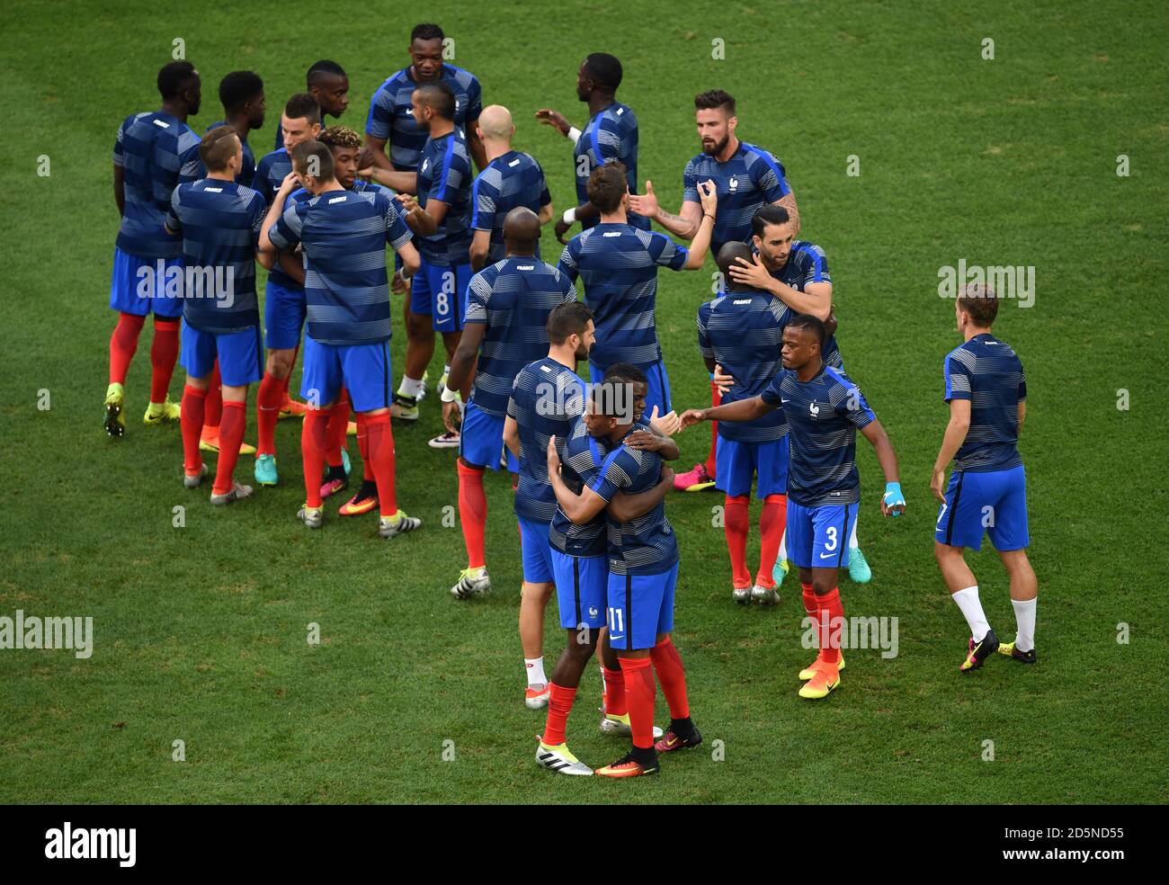 France's Paul Pogba (bottom) and team-mate Anthony Martial embrace as ...