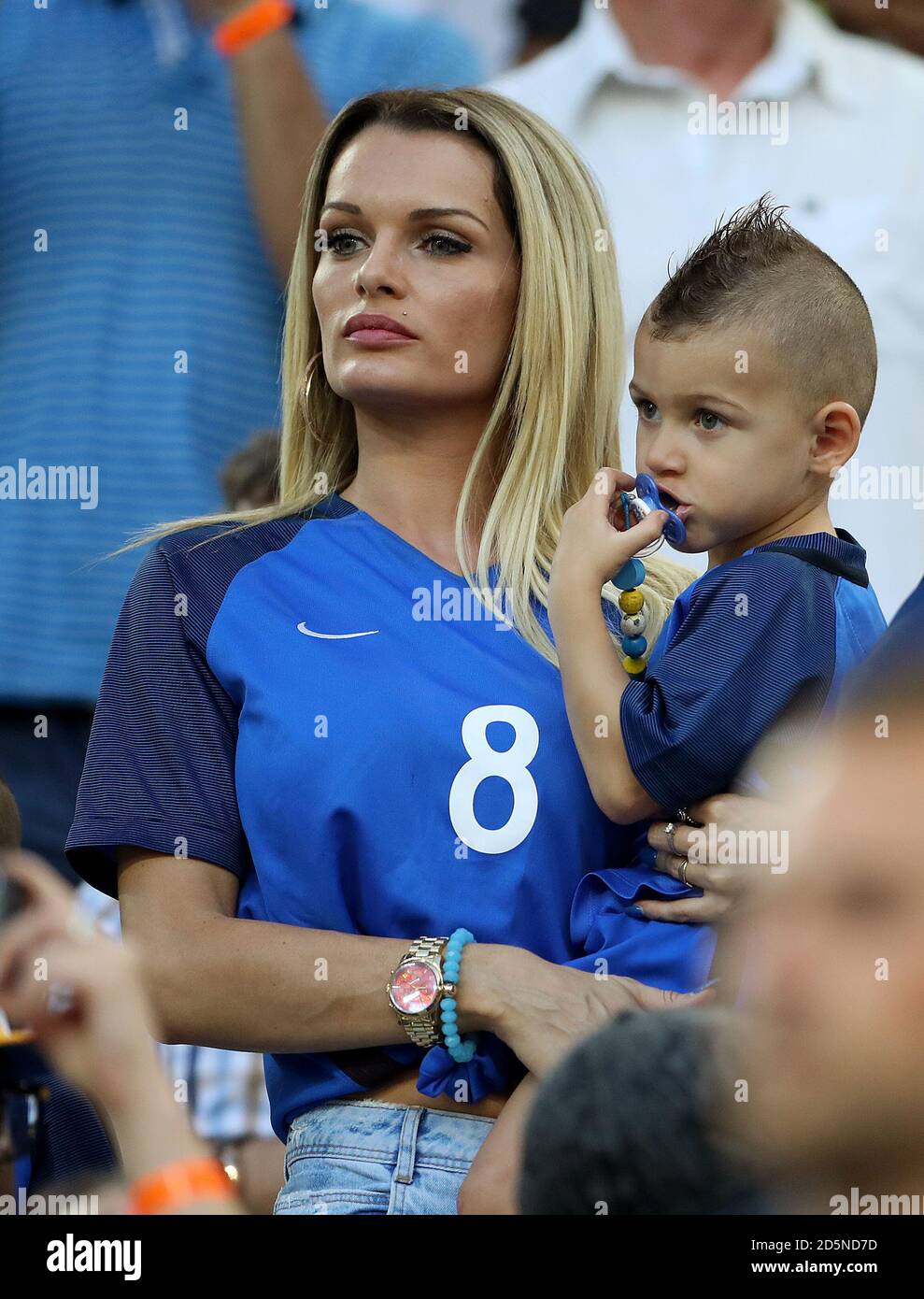 Ludivine Payet, wife of Dimitri Payet, with her son Milan Payet Stock ...