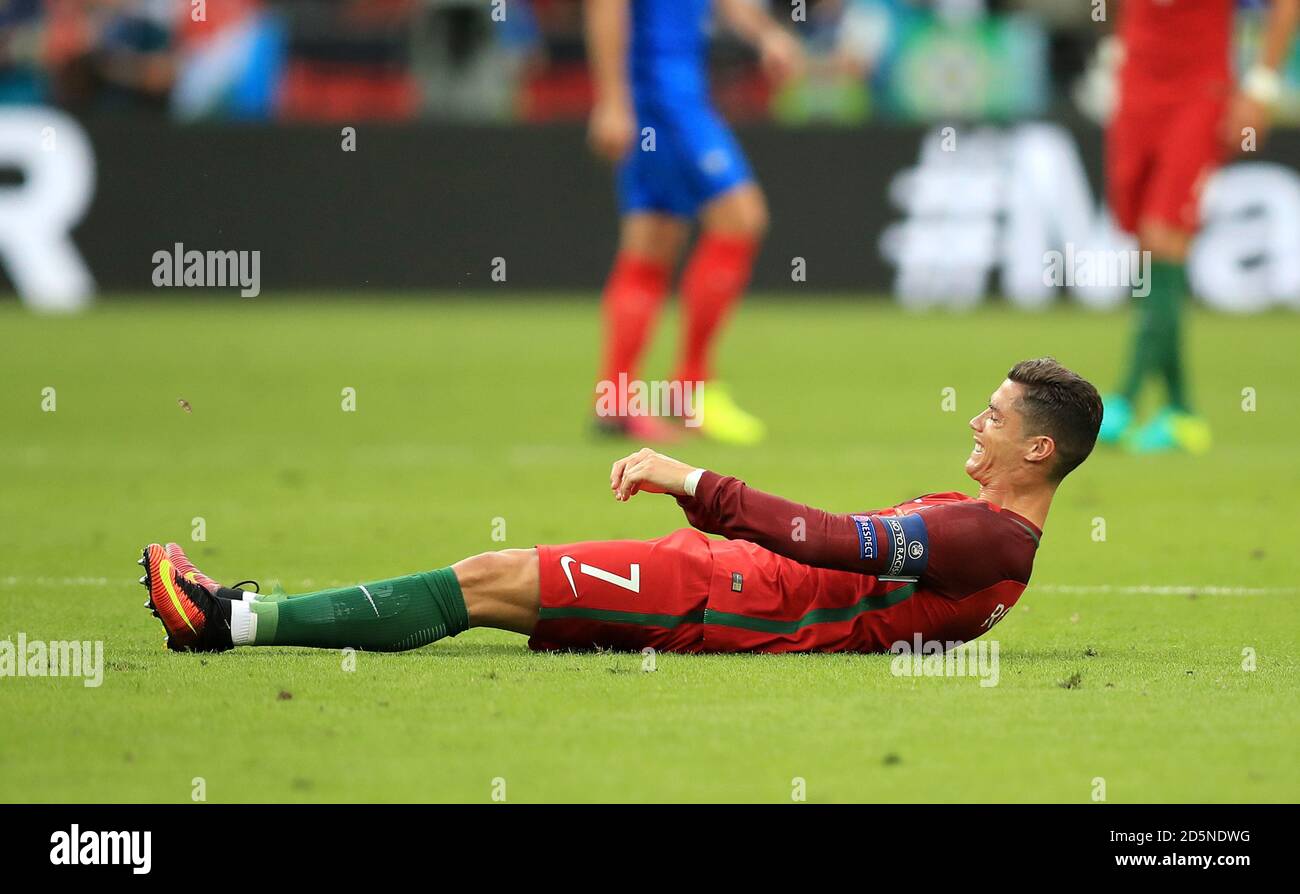 Portugal's Cristiano Ronaldo collapses to the ground injured early in ...