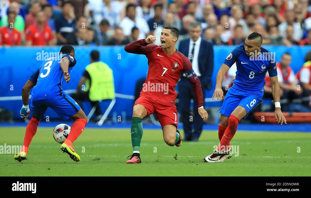 Portugal's Cristiano Ronaldo (centre) picks up an injury after a ...