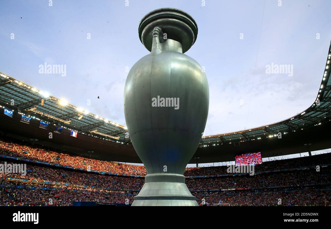 A giant UEFA Euro 2016 trophy surrounded by moths during the final ...