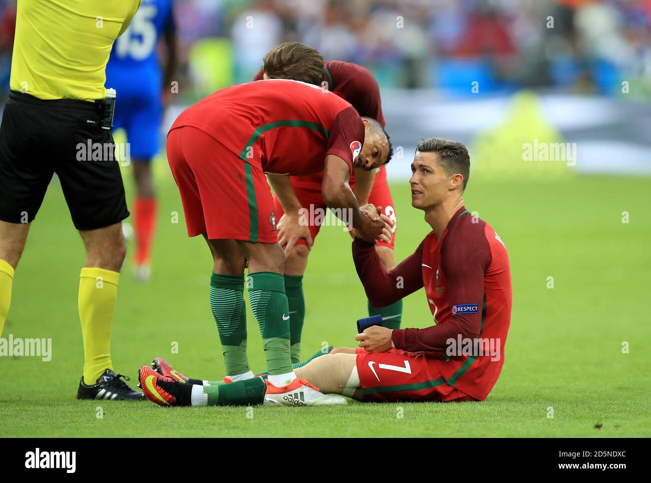 Portugal's Cristiano Ronaldo looks upset after picking up an injury ...