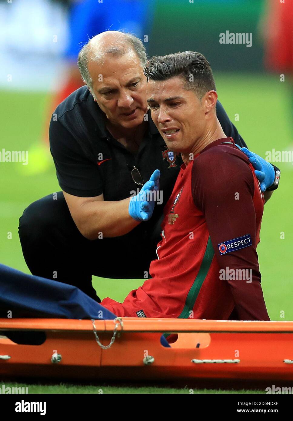 Portugal's Cristiano Ronaldo looks upset after picking up an injury ...