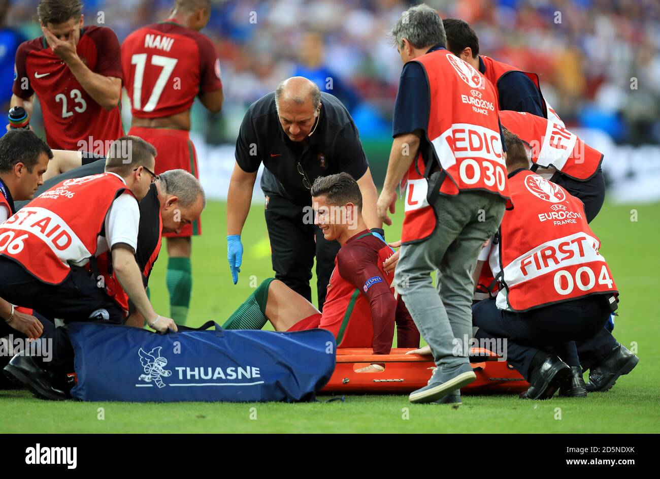 Portugal's Cristiano Ronaldo looks upset after picking up an injury ...