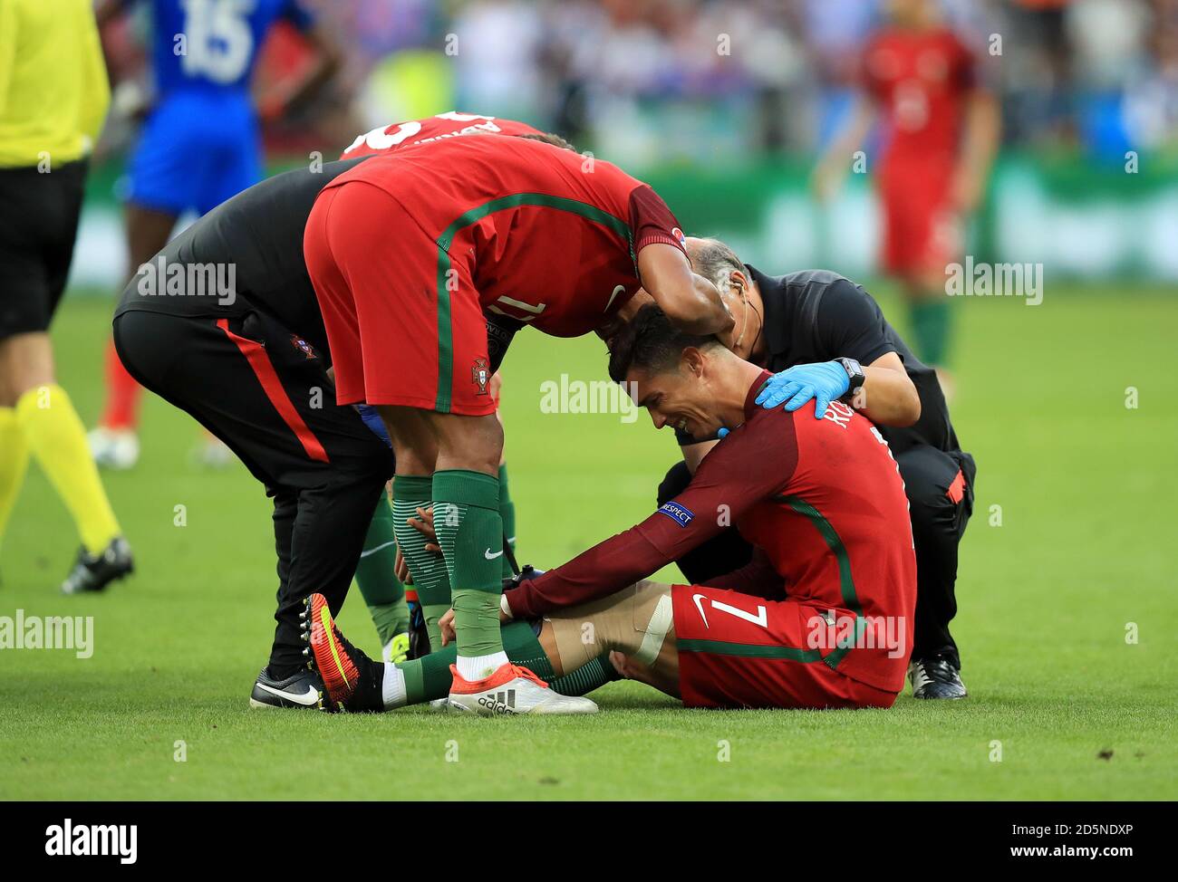 Portugal's Cristiano Ronaldo looks upset after picking up an injury ...