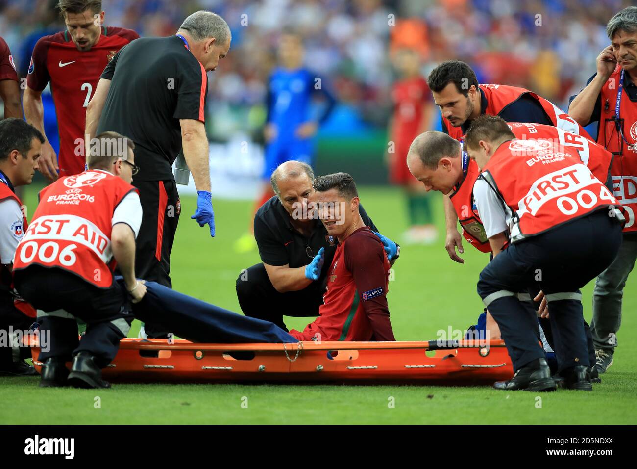 Portugal's Cristiano Ronaldo looks upset after picking up an injury ...