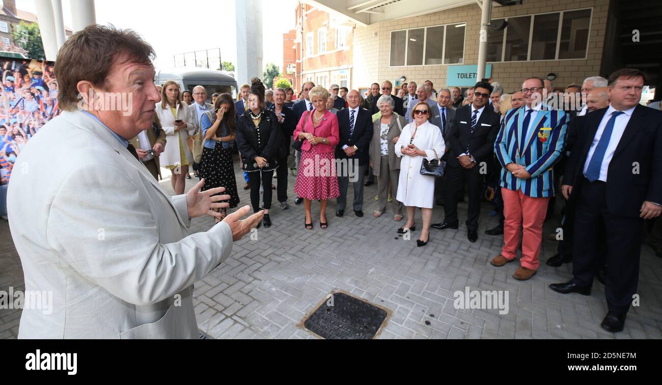 Stuart "Tiger" Surridge (left) addresses the members after cutting the ...