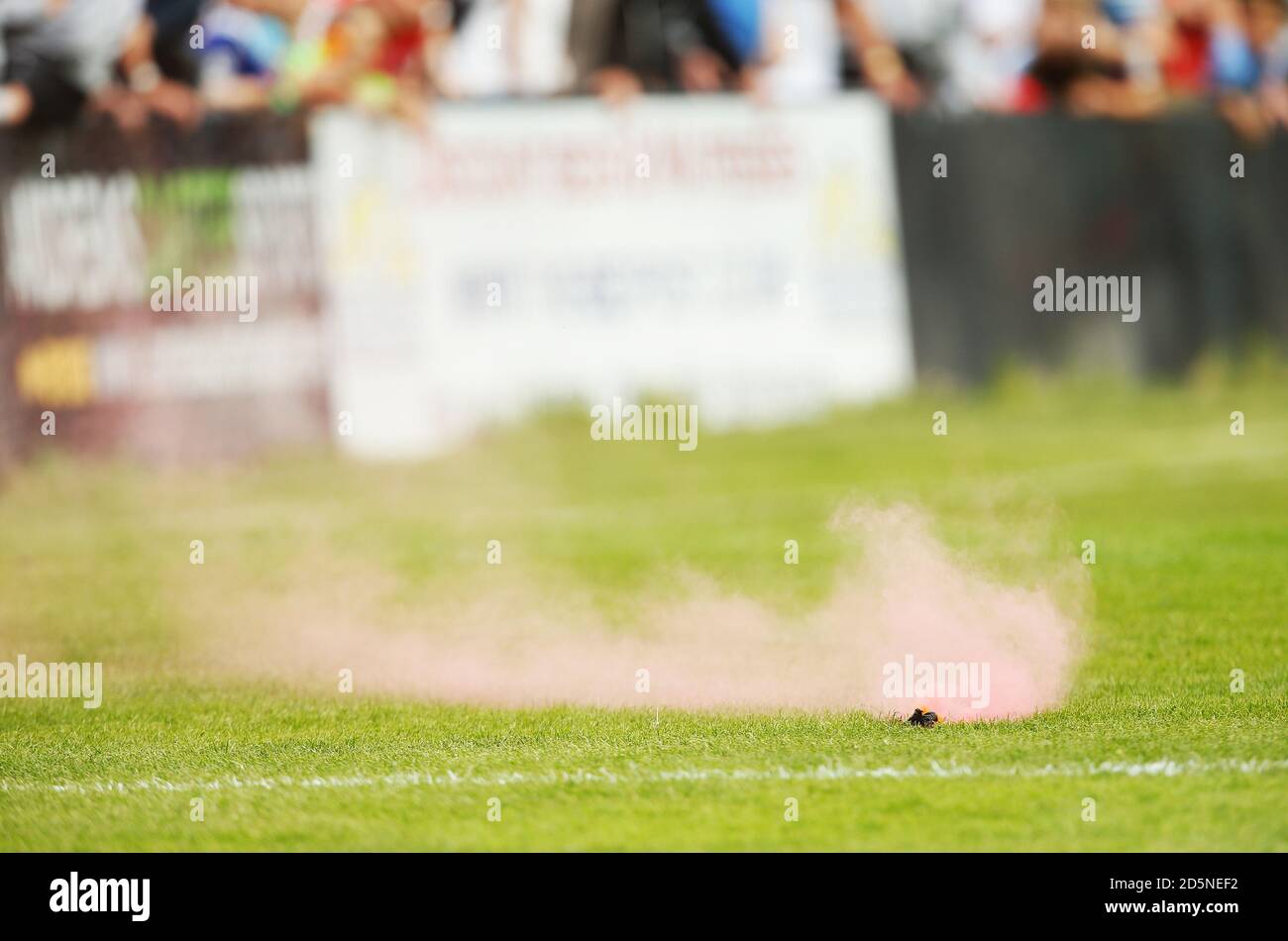 Smoke bomb on football pitch hi-res stock photography and images - Alamy