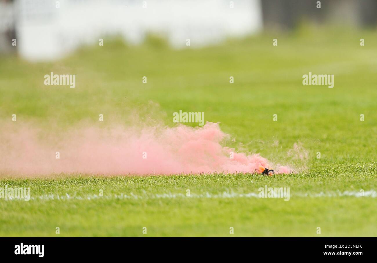 Smoke bomb on football pitch hi-res stock photography and images - Alamy