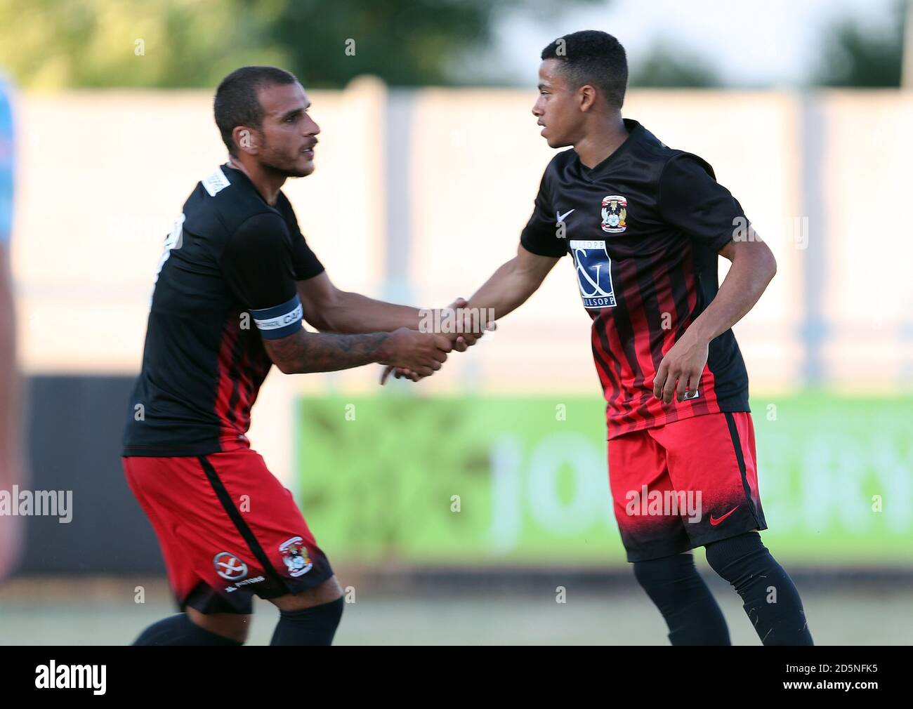 Marcus Tudgay (left) and Kyle Spence celebrate Coventry City's first ...