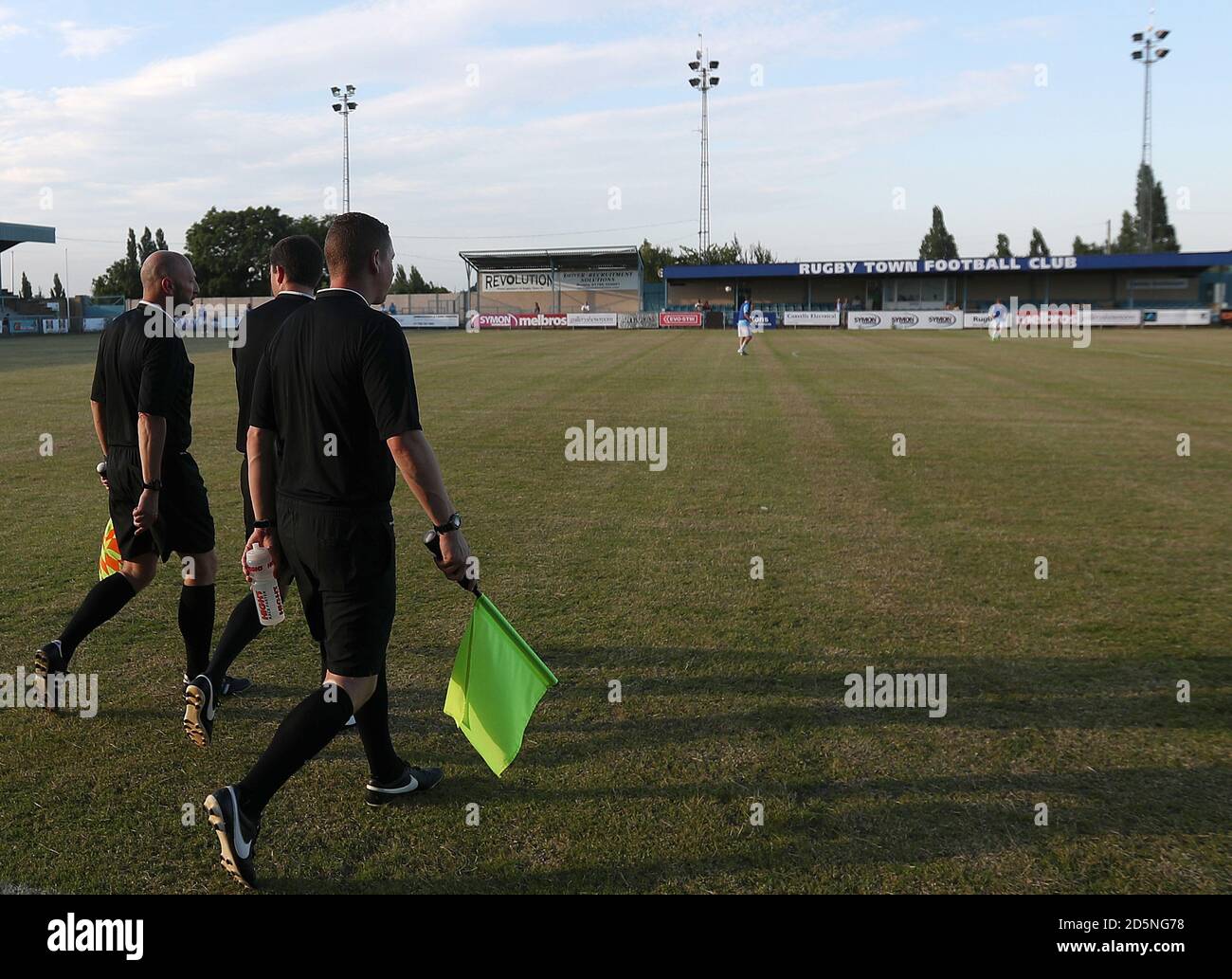 Match officials walk onto pitch prior to kick off Stock Photo - Alamy