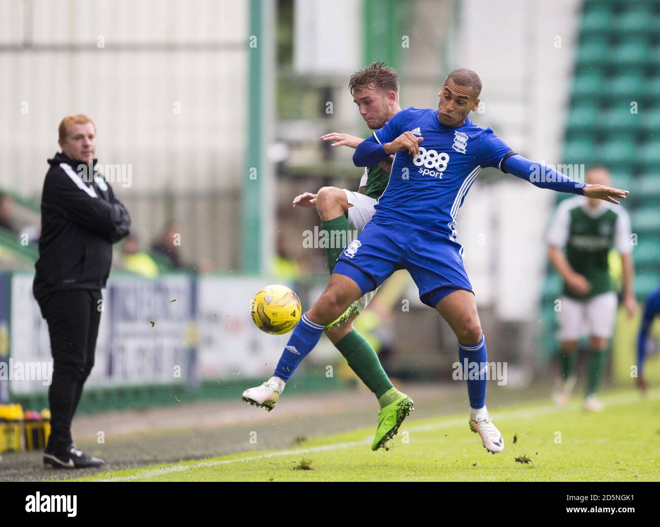 Hibernian's Callum Crane (left) and Birmingham City's James Vaughan ... Hibernian's Callum Crane (left) and Birmingham City's James Vaughan ...