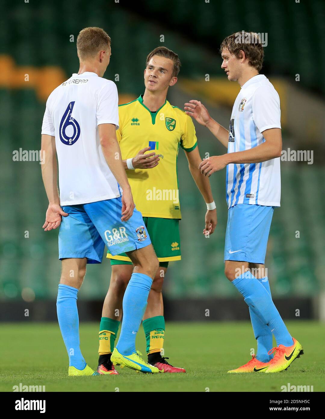 Coventry City's Callum Maycock (right) and Andy Rose greet Norwich City ...