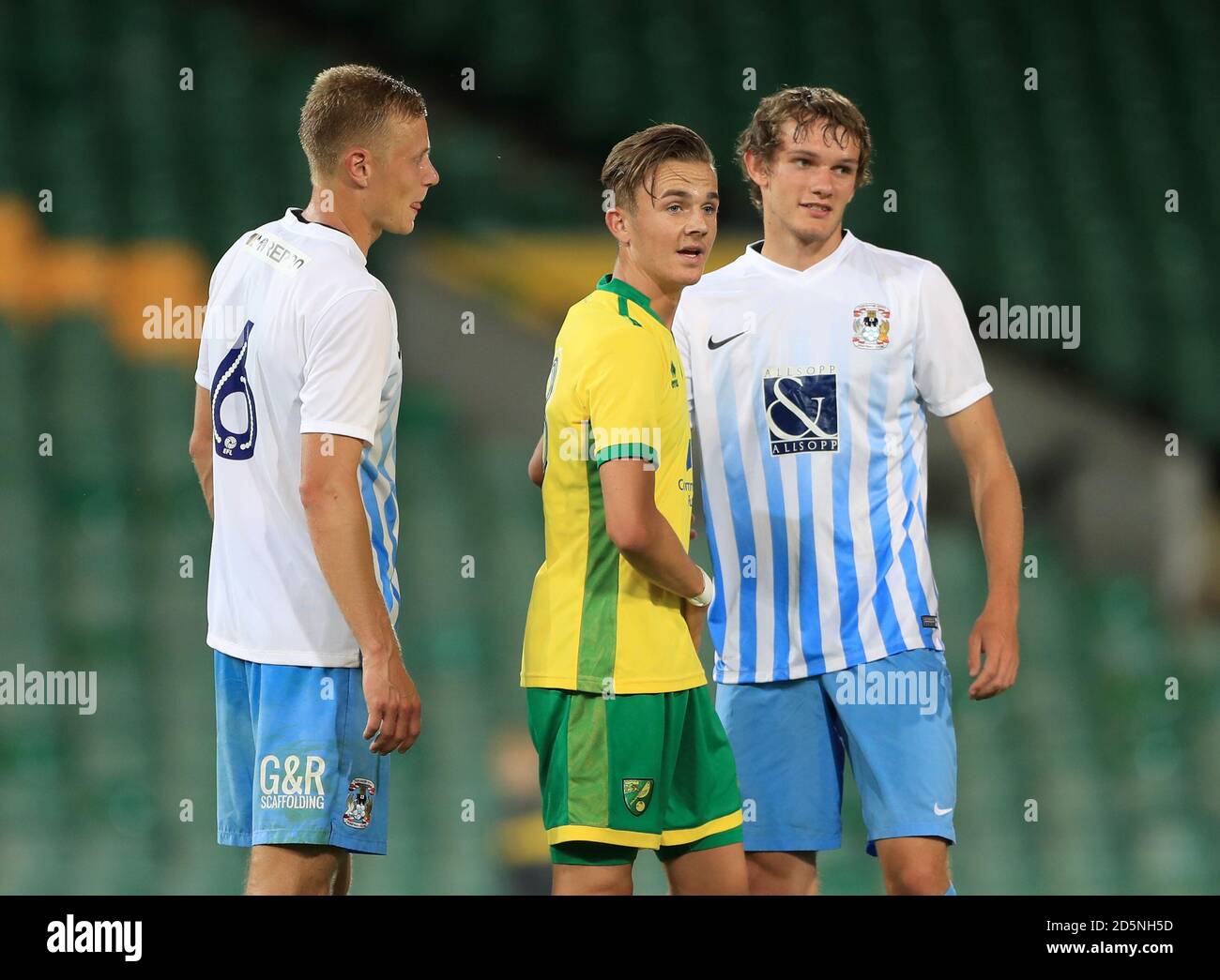 Coventry City's Callum Maycock (right) and Andy Rose greet Norwich City ...